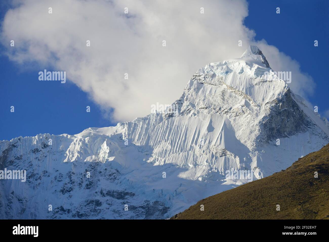 Summit of Nevado Huandoy with cloud, Cordillera Blanca, near Caraz ...
