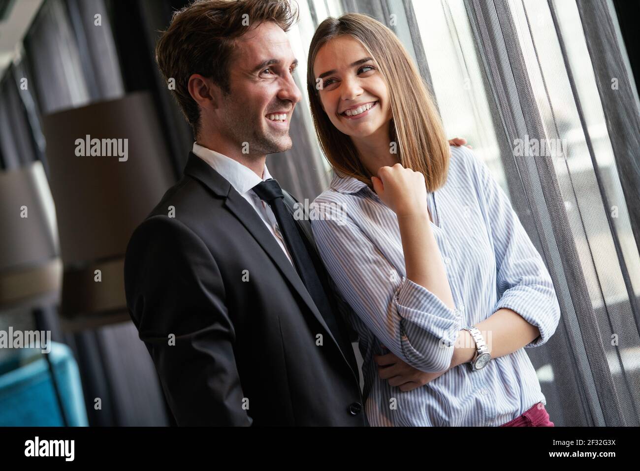 Romantic happy young couple relax at modern home indoors Stock Photo ...