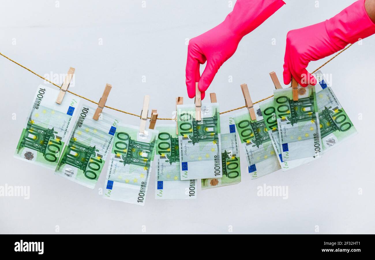 Symbol photo money laundering Stock Photo - Alamy