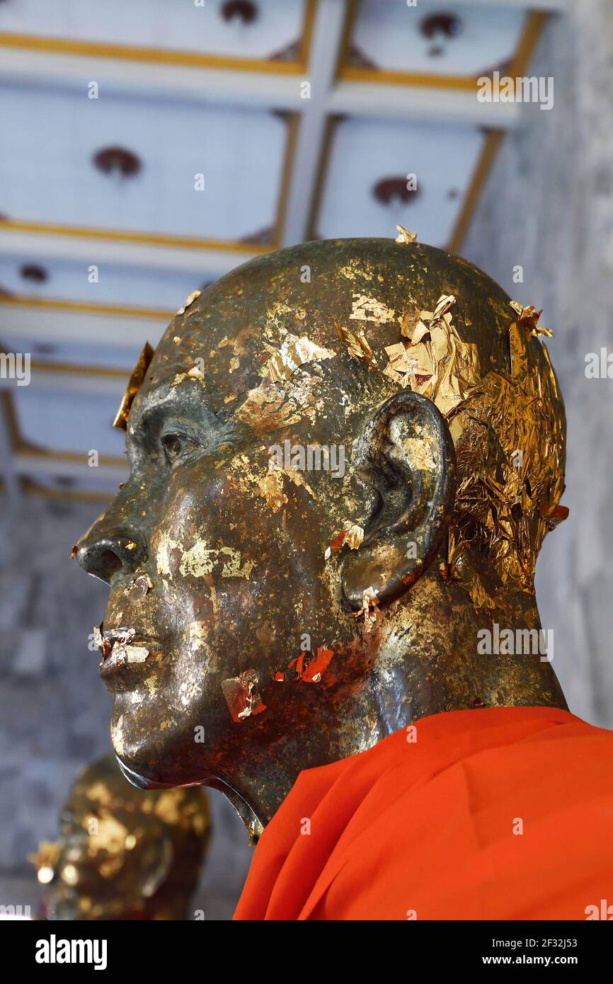 Monk's head covered with gold leaf, Wat Chalong, temple on Phuket ...