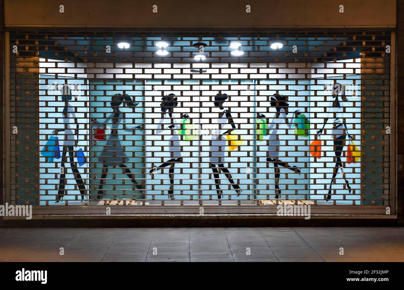 Closed fashion store, bars in front of shop window, lockdown, Corona ...