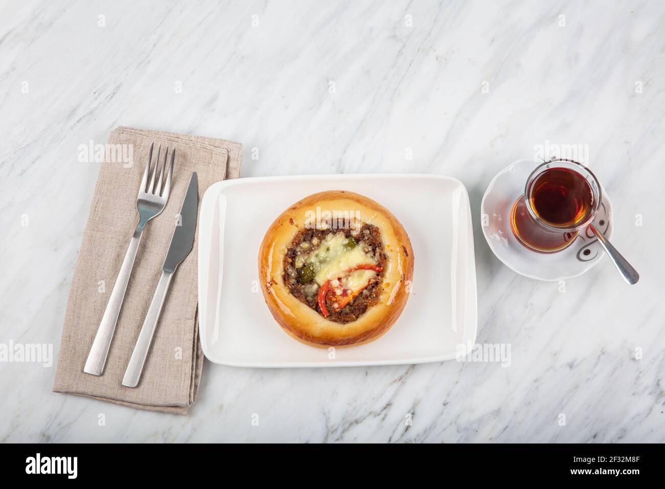 Turkish cuisine minced Mini Pizza. Puff pastry mini pizza with tomato ...