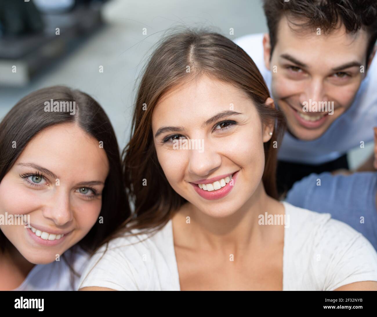 Group of friends taking a selfie together Stock Photo - Alamy