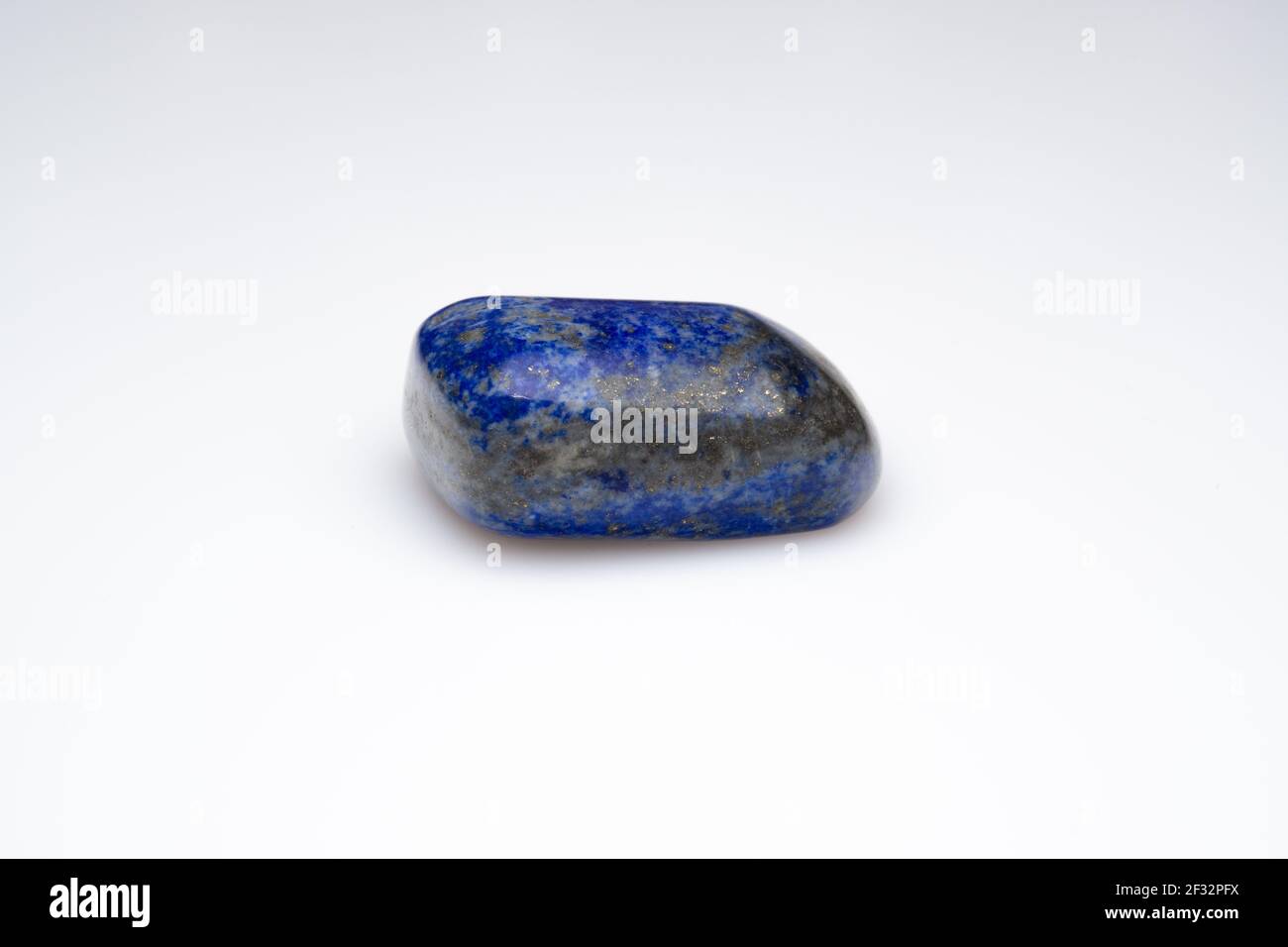 Natural lapis lazuli on white background Stock Photo - Alamy