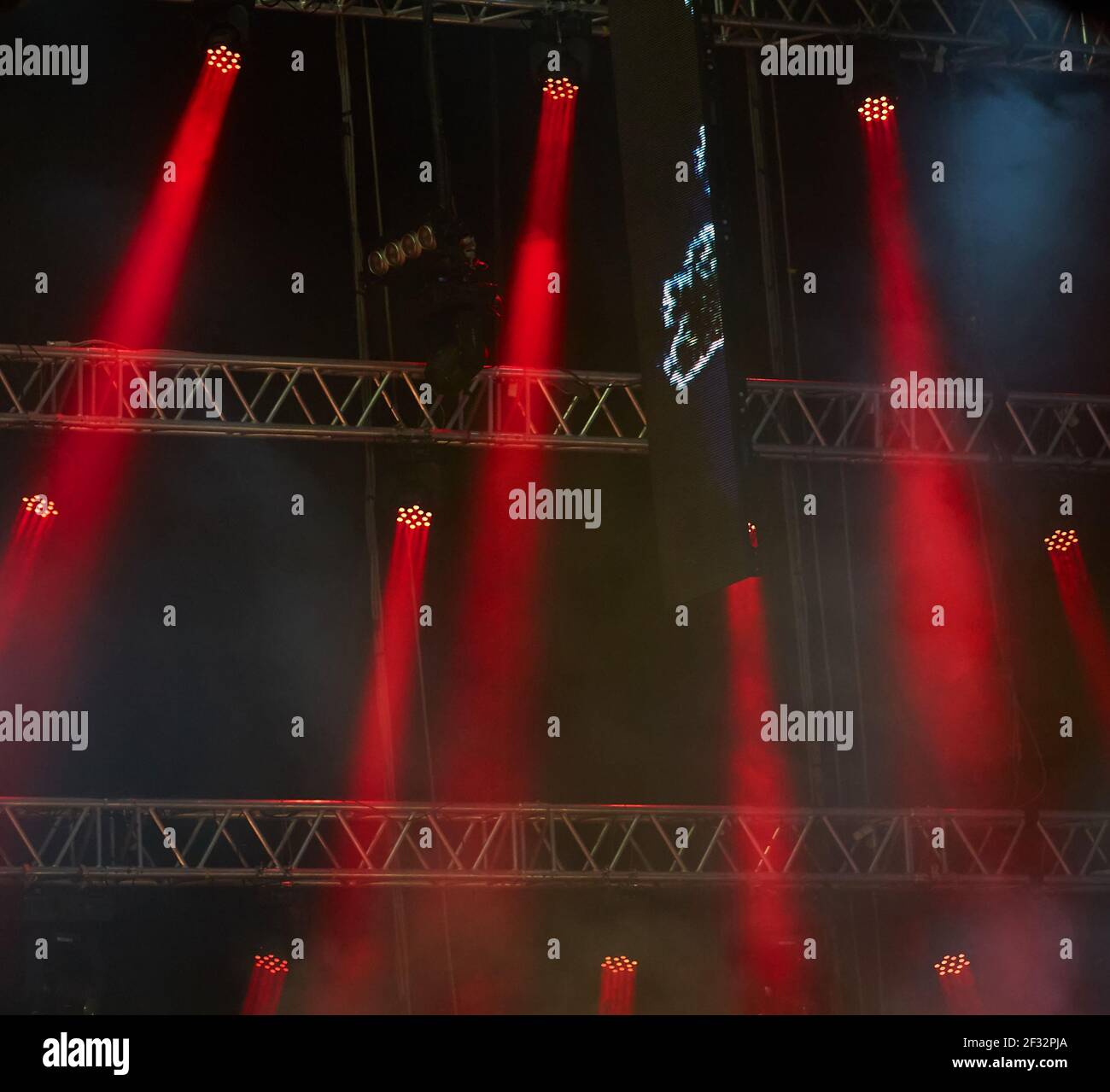 Red spot lights in a music concert Stock Photo - Alamy