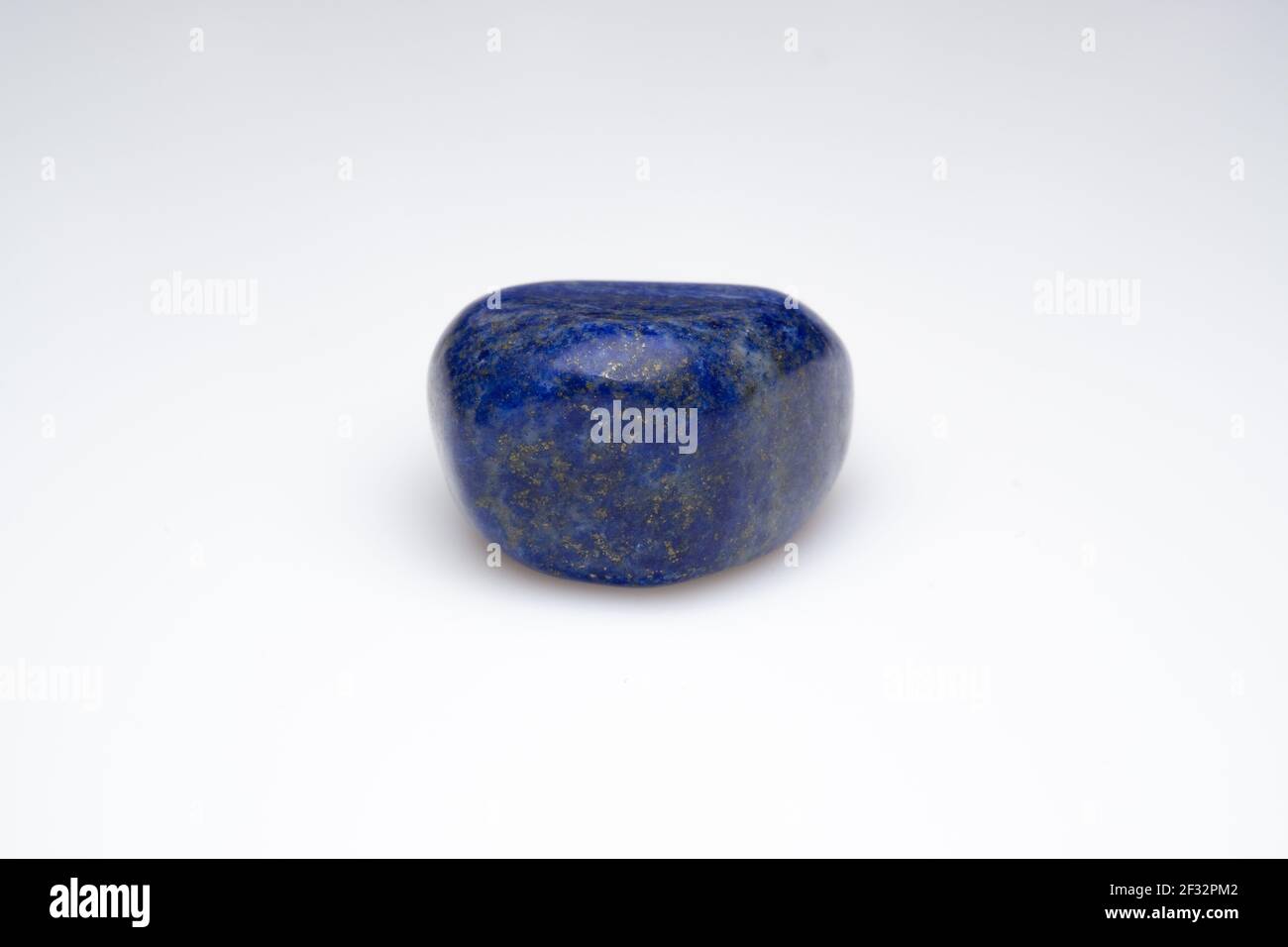 Natural lapis lazuli on white background Stock Photo - Alamy