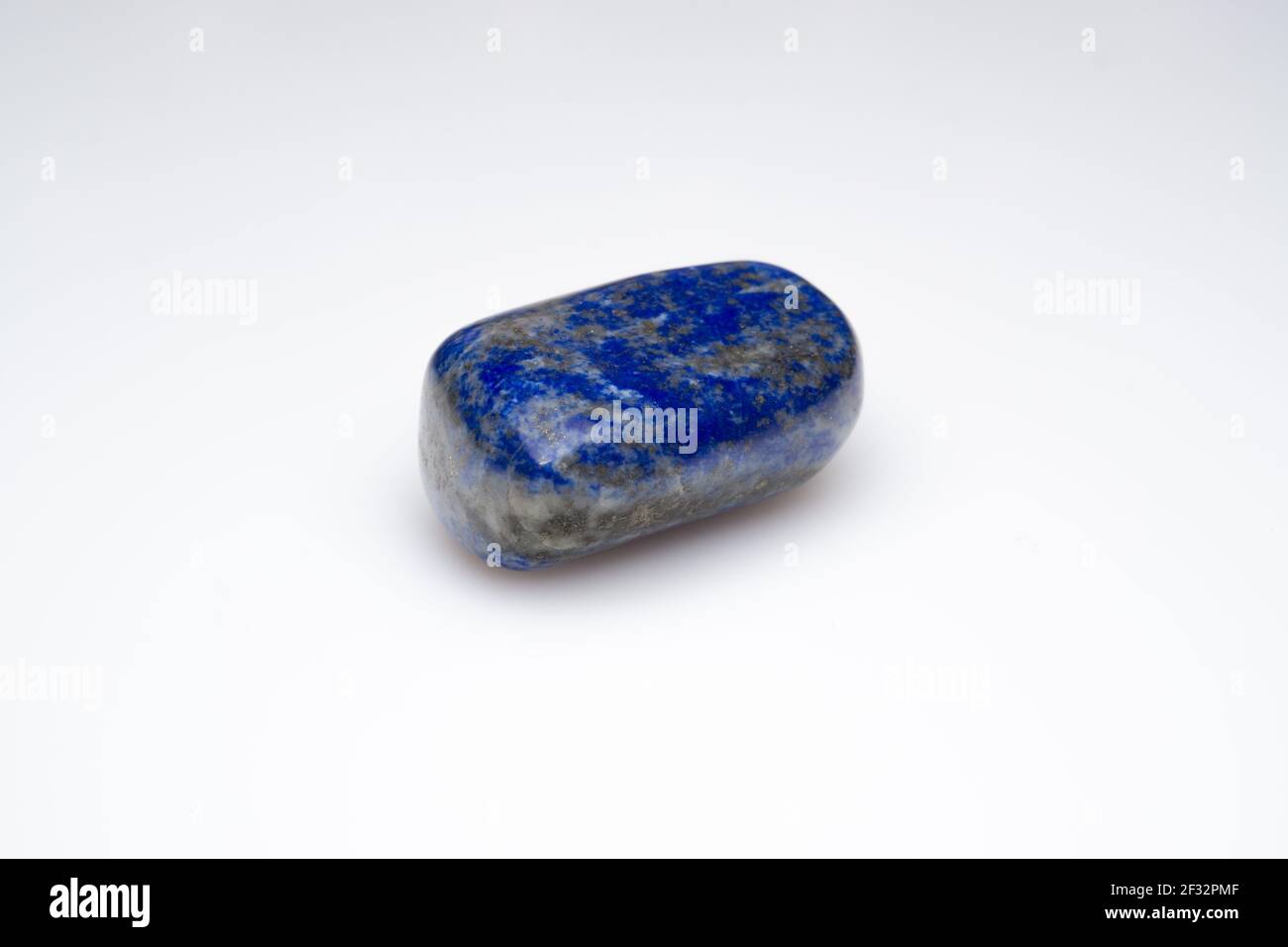 Natural lapis lazuli on white background Stock Photo - Alamy