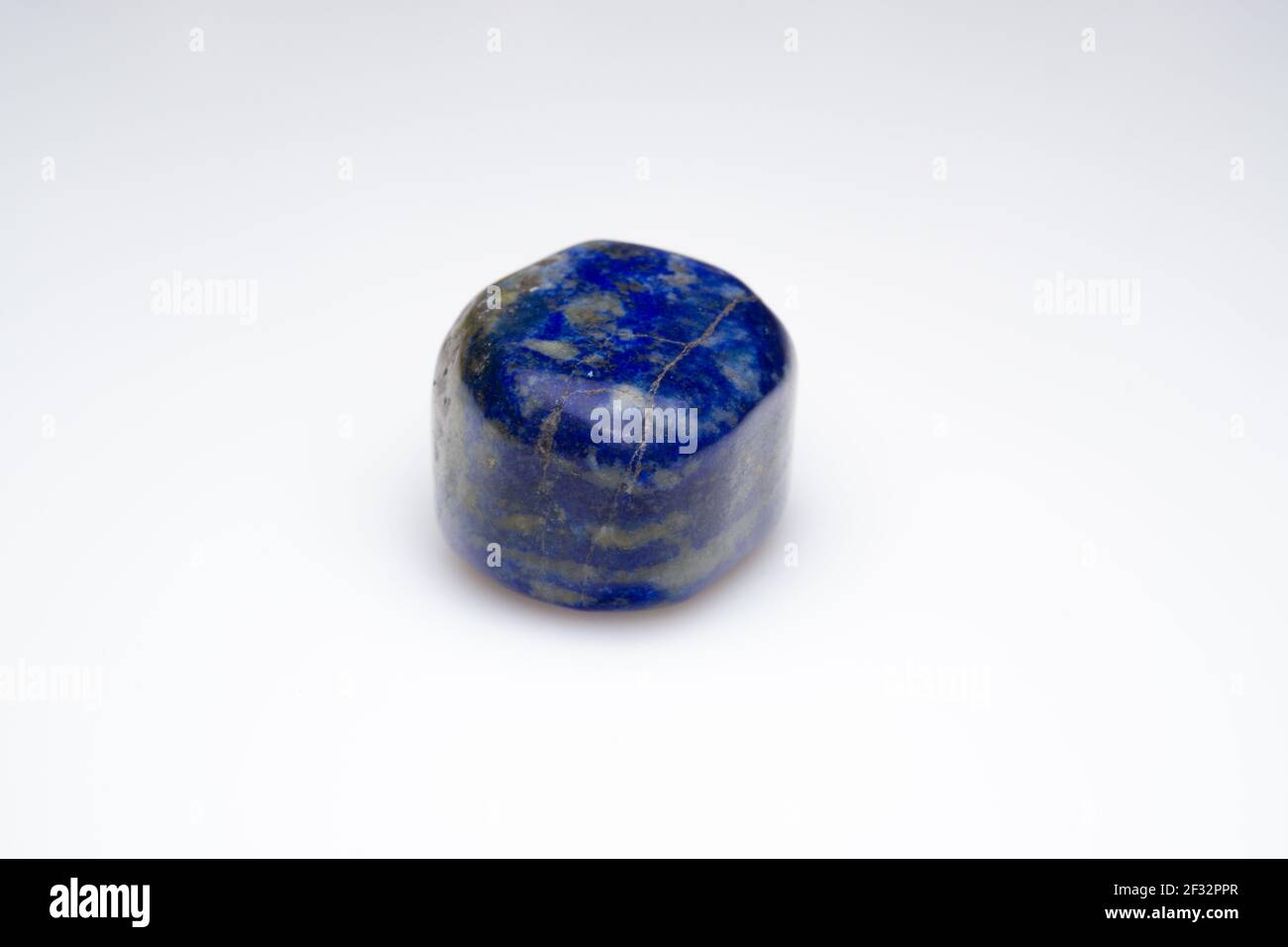 Natural lapis lazuli on white background Stock Photo - Alamy