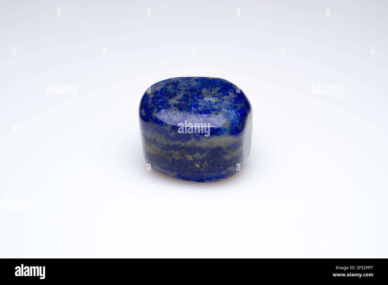 Natural lapis lazuli on white background Stock Photo - Alamy
