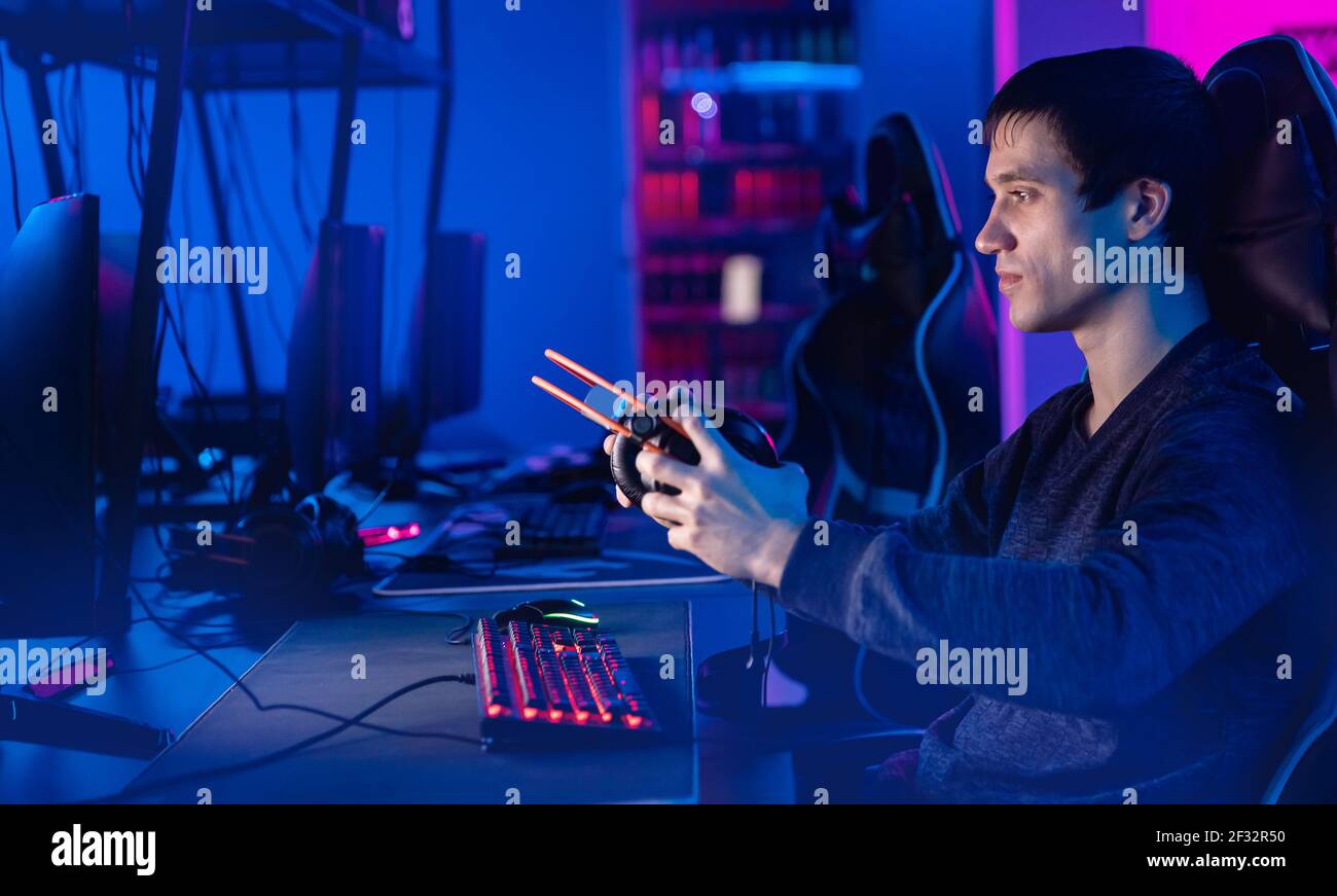 Streamer professional cyber sport gamer playing online computer game ...