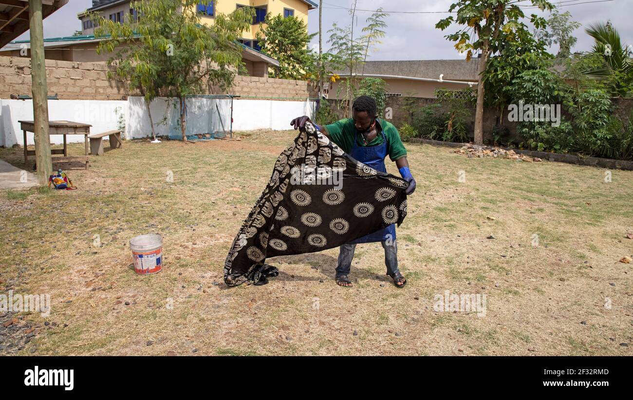 Batik die wax stamped material Accra Ghana. Ghanaian family makes ...