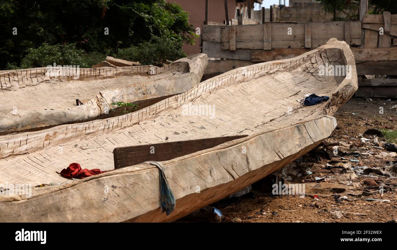 Dugout fishing canoe boat Liberia Africa. Handmade wooden boats for fishing and transportation ...