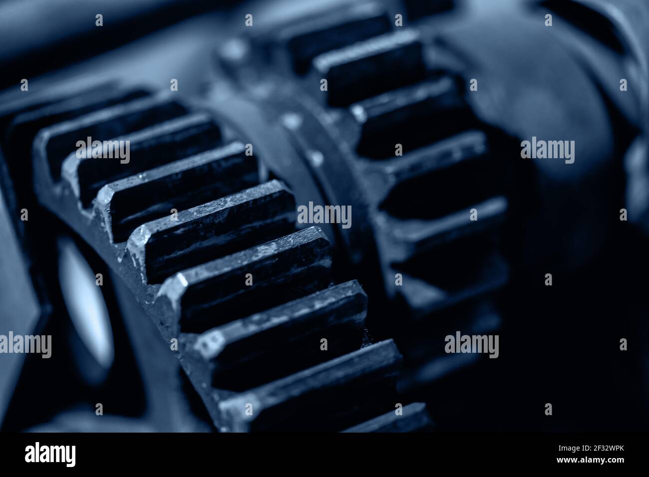 Large cog wheels in motor machine gear box, Industrial background Stock ...