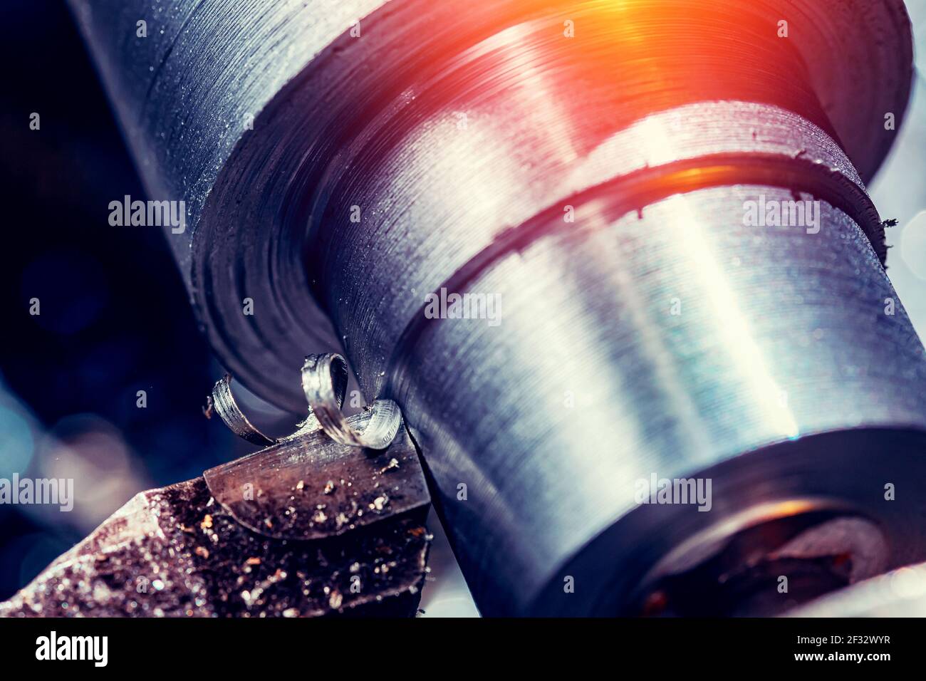 Process CNC lathe machine cutting metal. Modern industrial iron ...