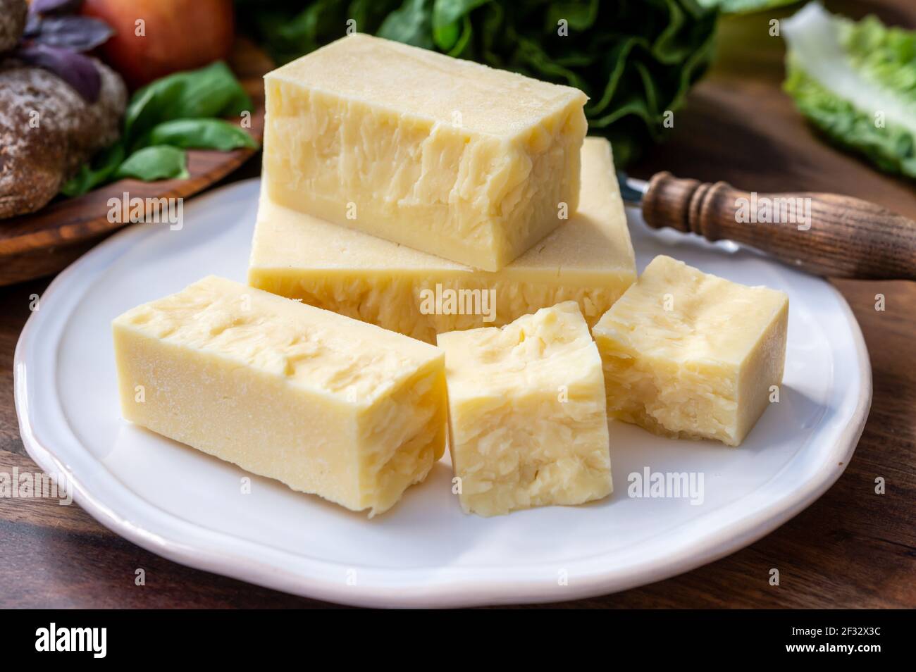 Cheese collection, pieces of aged British cheddar cheese close up Stock ...