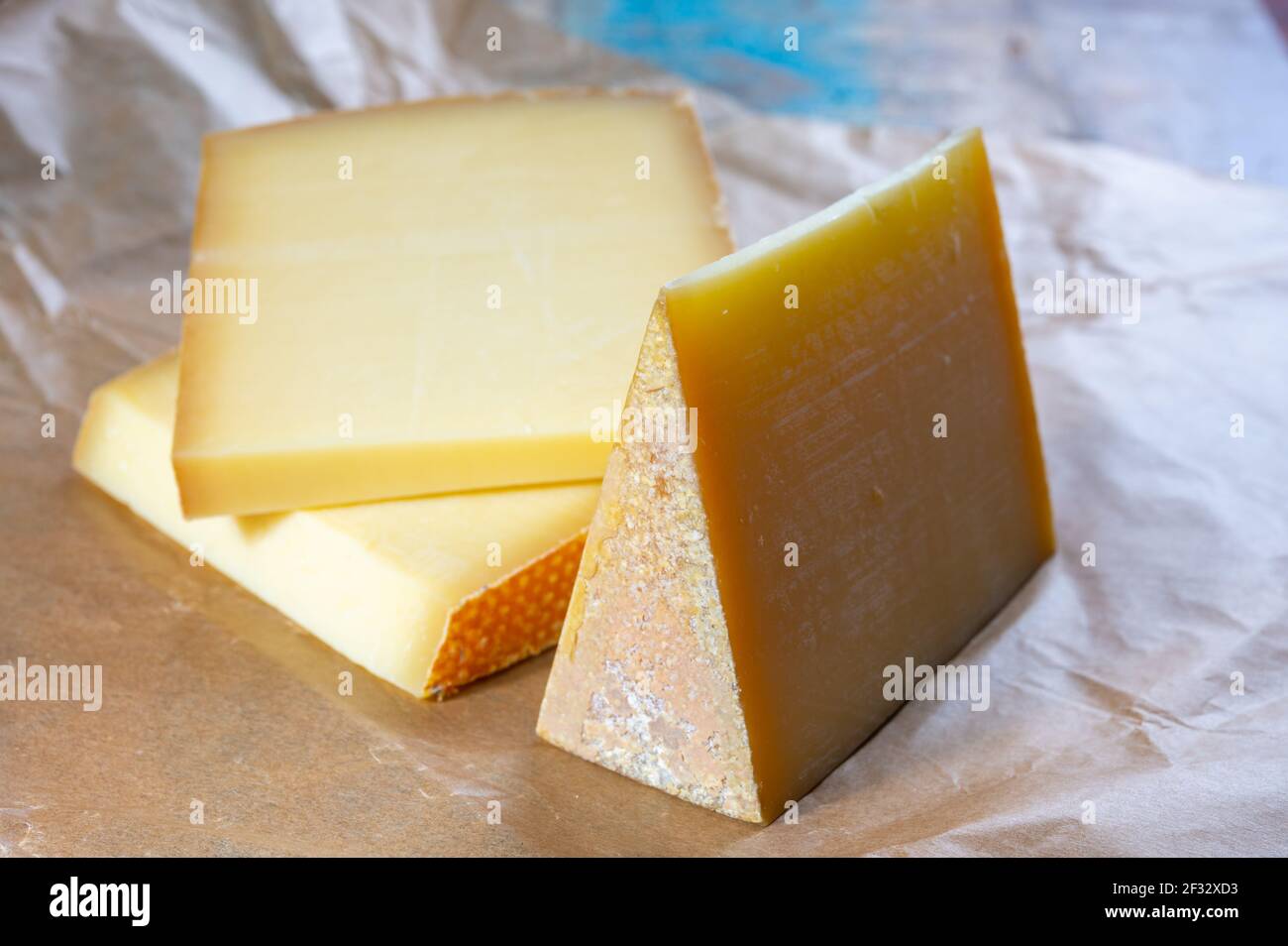Cheese collection, French comte and Swiss gruyere cheeses close up ...