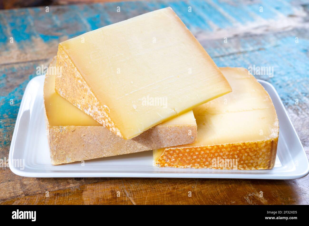 Cheese collection, French comte and Swiss gruyere cheeses close up ...