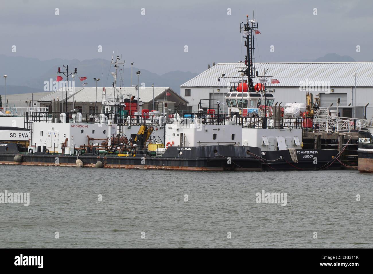 SD Oilman and SD Waterpress, both Clyde-based barges operated by Serco ...