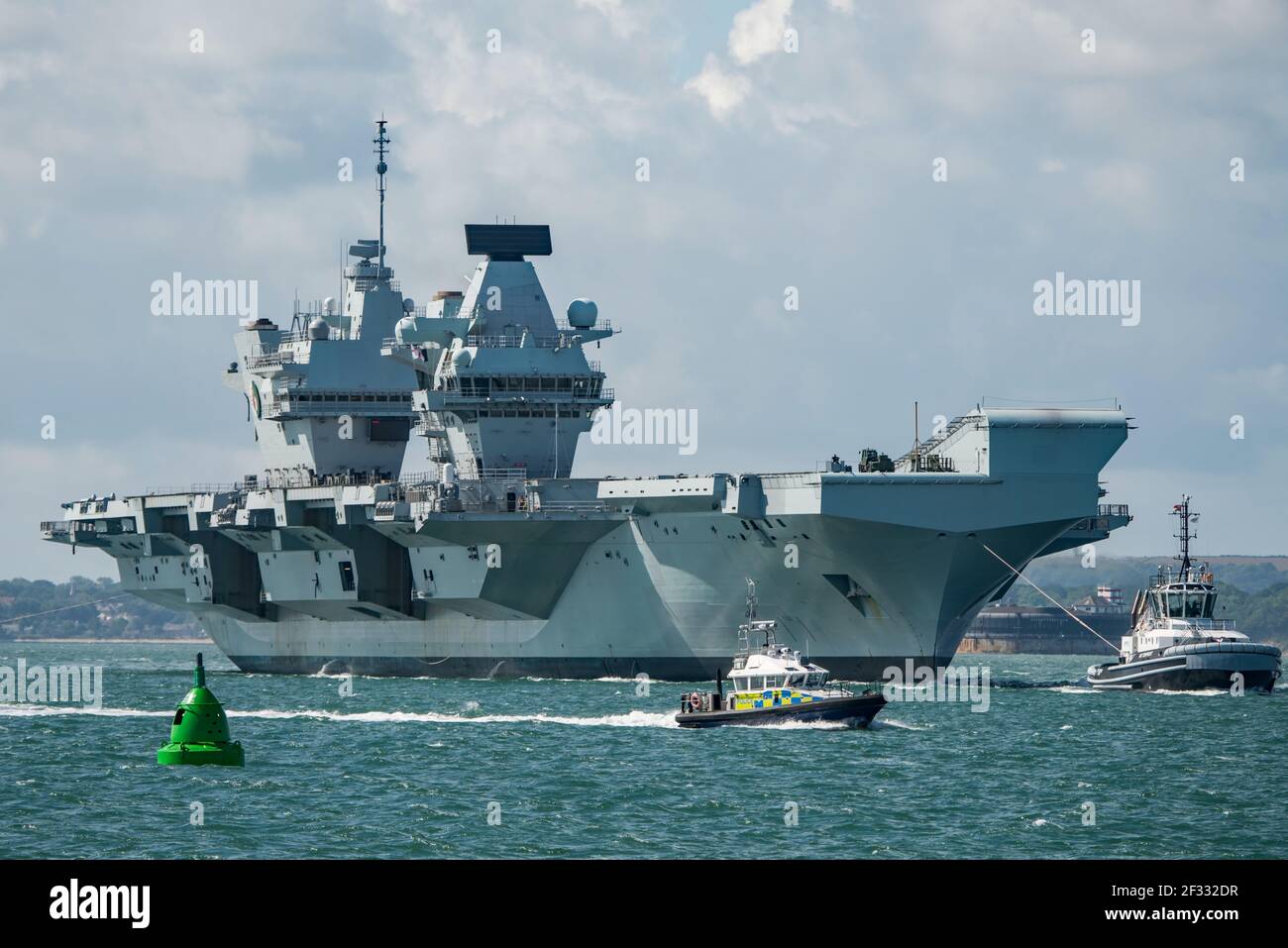 The Royal Navy aircraft carrier HMS Queen Elizabeth (R08) returning to ...