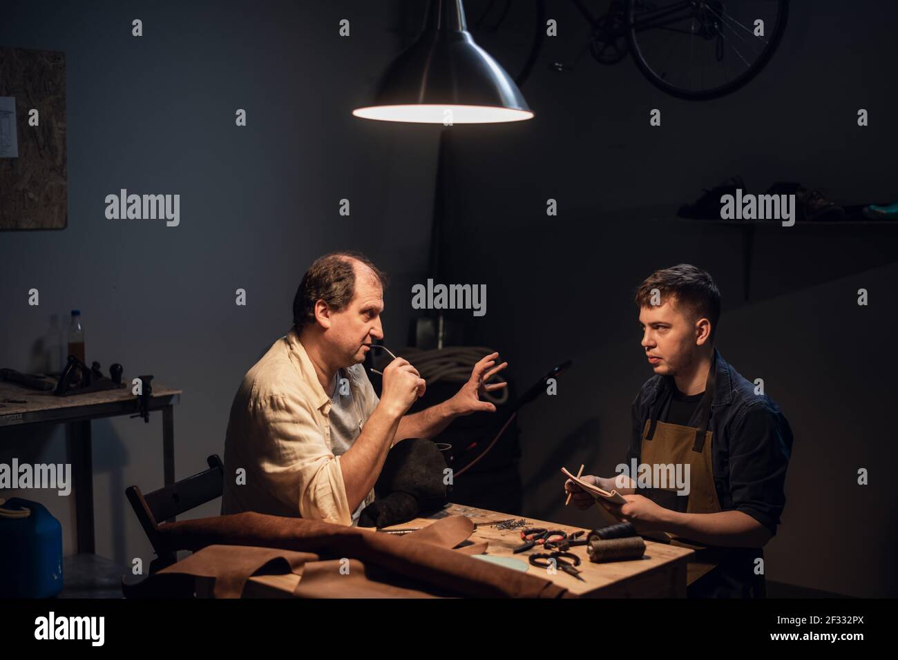 a cute young guy wants to make a gift with his own hands, an ...