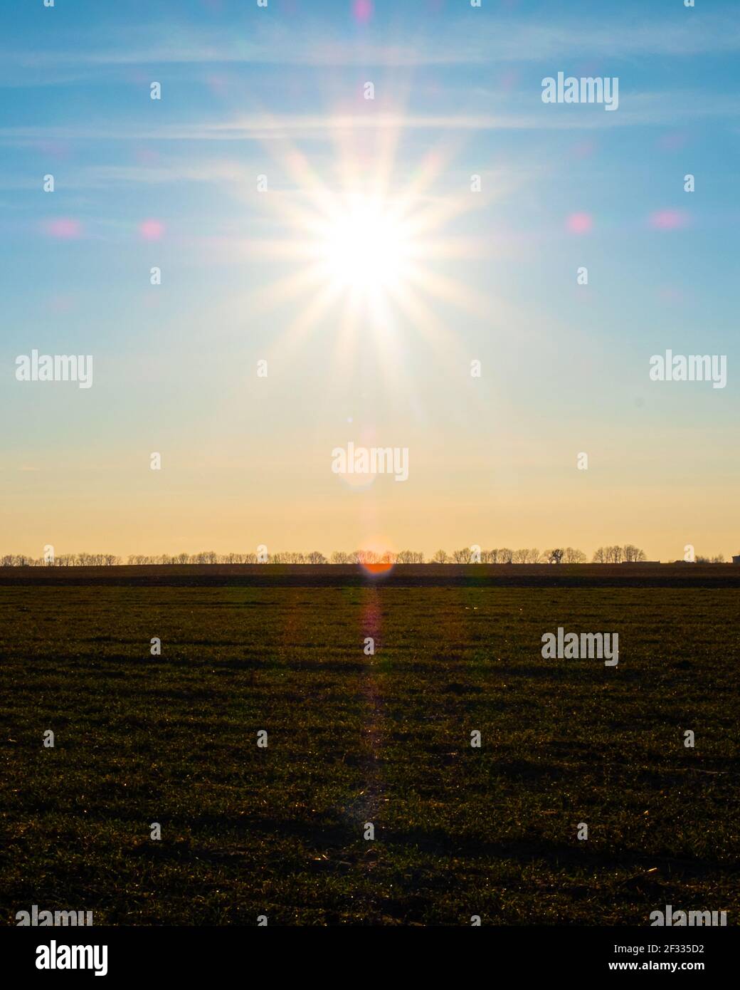 scenery beautiful setting sun, field empty space Stock Photo - Alamy