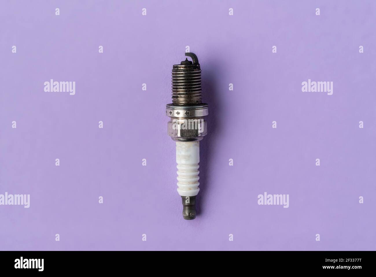 iridium car candle flat lay, spark plug and ignition system equipment ...