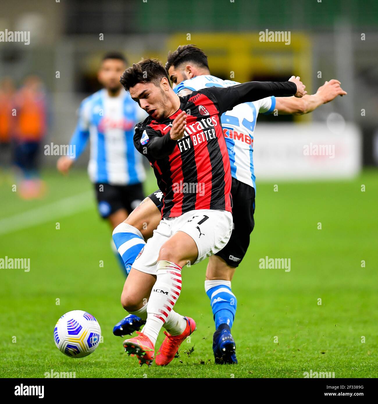 Milan, Italy. 14th Mar, 2021. AC Milan's Brahim Diaz (L) vies with ...
