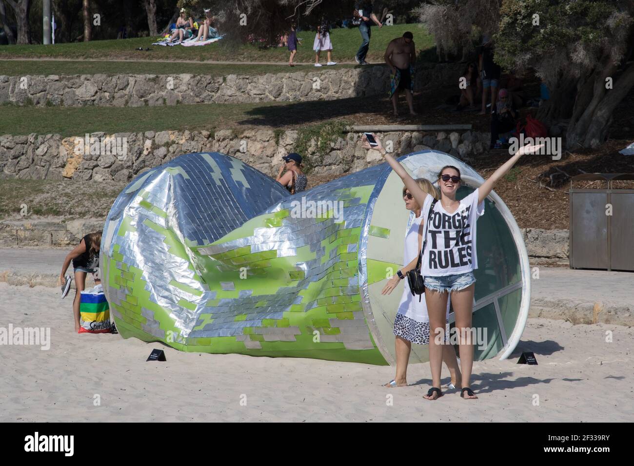 Sculpture of Crushed Tin Can on Beach Stock Photo - Alamy