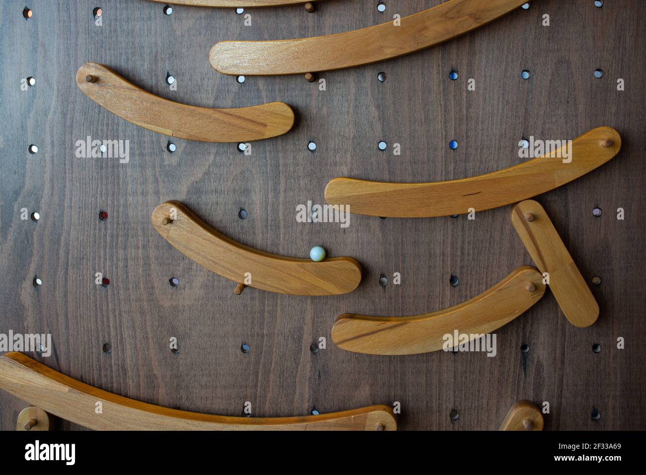 Concept of creative logical thinking. Wooden blocks. Geometric shapes ...