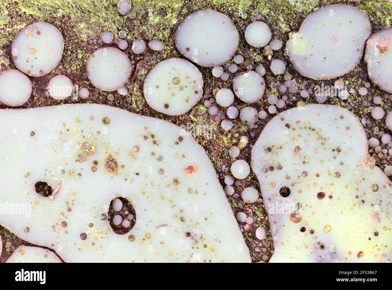 Frozen oil and golden glitter abstract pattern. Light pink and gold ...