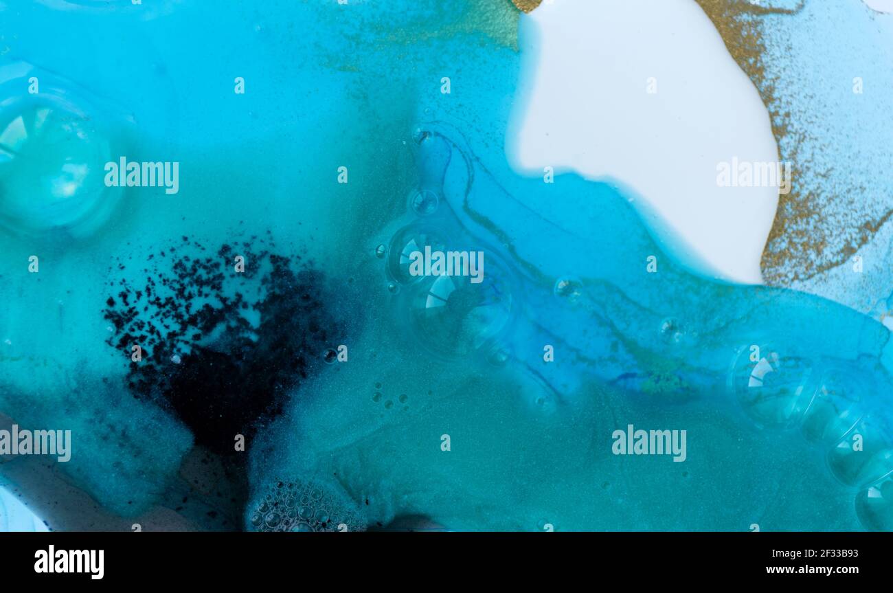 Abstract gold, black and blue liquid pattern Stock Photo - Alamy