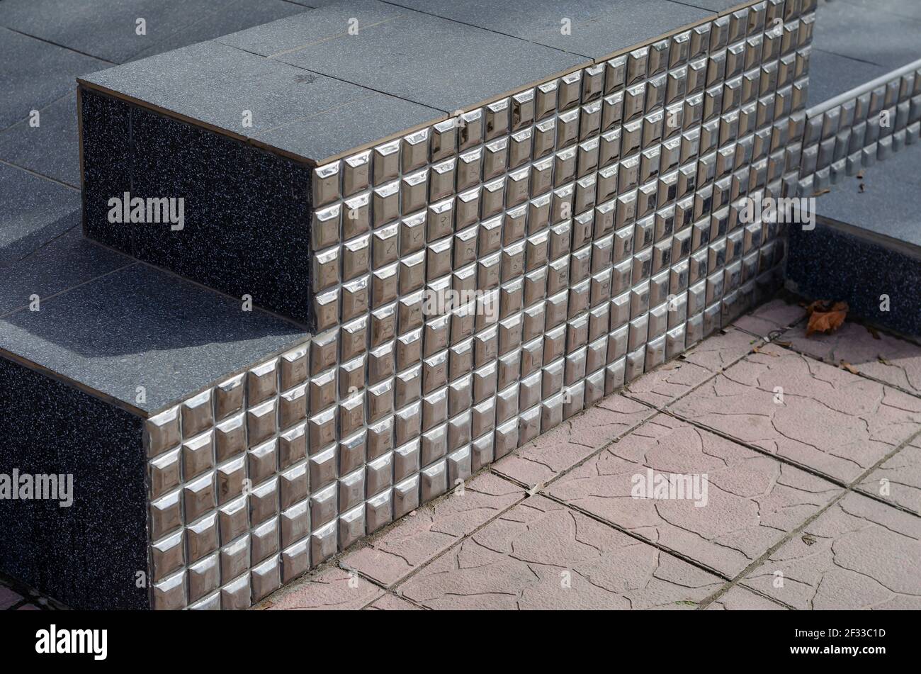 Fragment of black steps and ramp for the disabled. Entrance to the ...