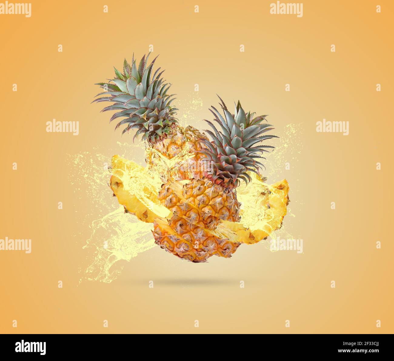 Water Splashing on Fresh Pineapple is tropical fruit isolated over ...
