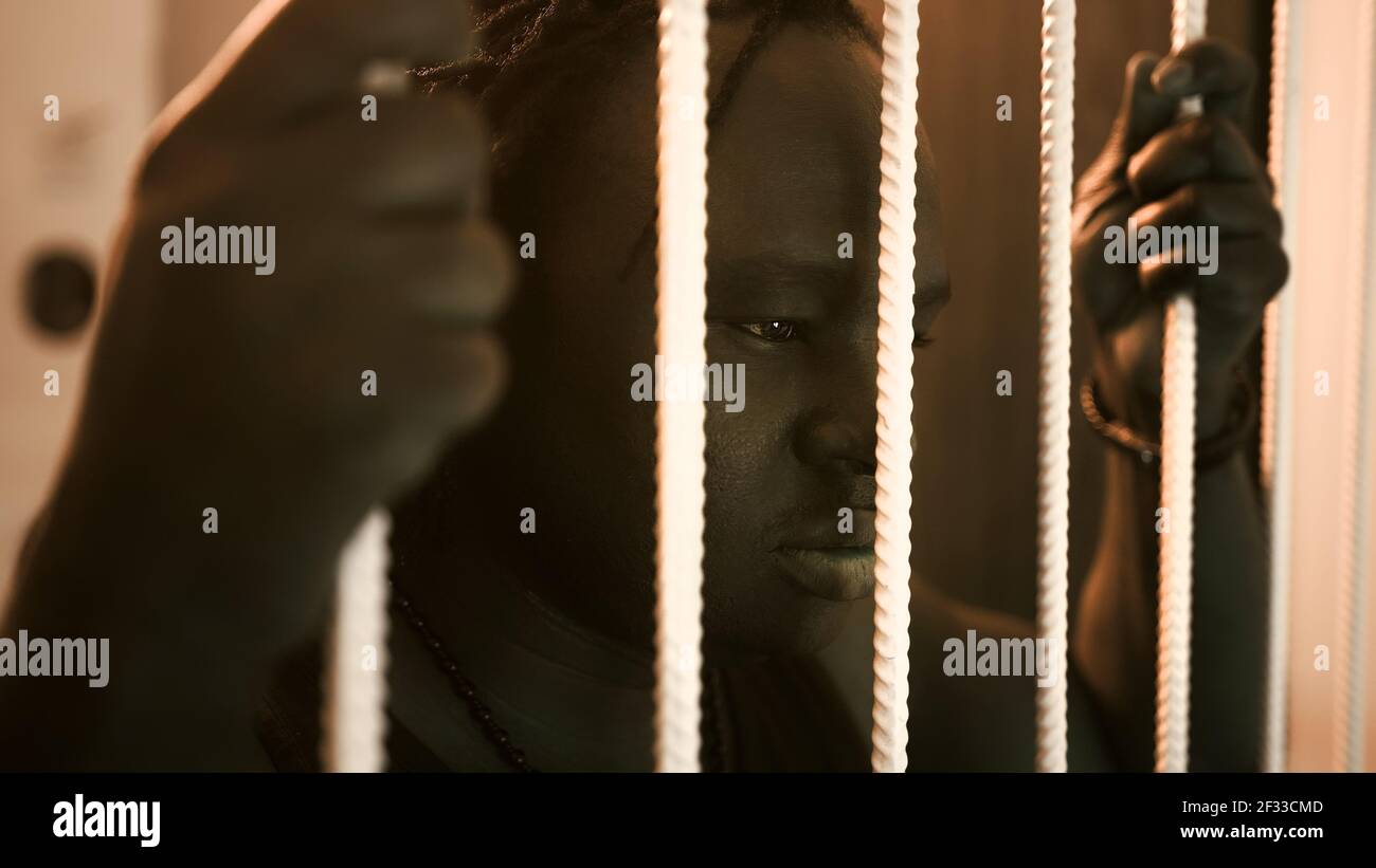 Man Behind Bars High Resolution Stock Photography and Images - Alamy