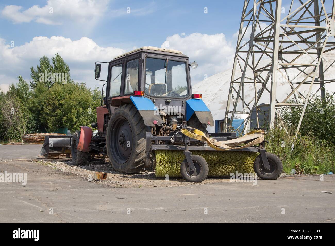 Street sweeper tractor Stock Photo - Alamy