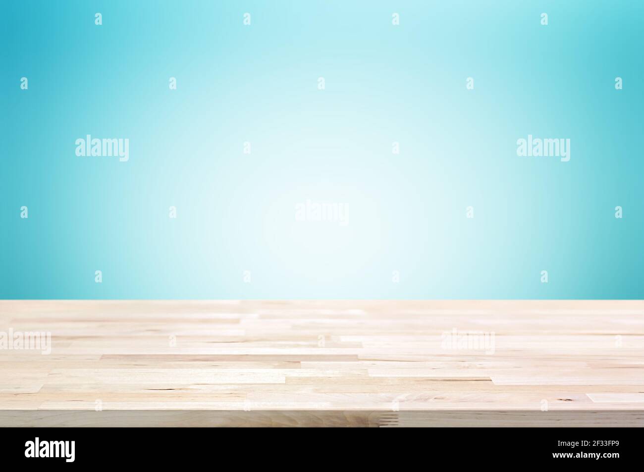 Wood table top on light blue gradient abstract background - can be used ...