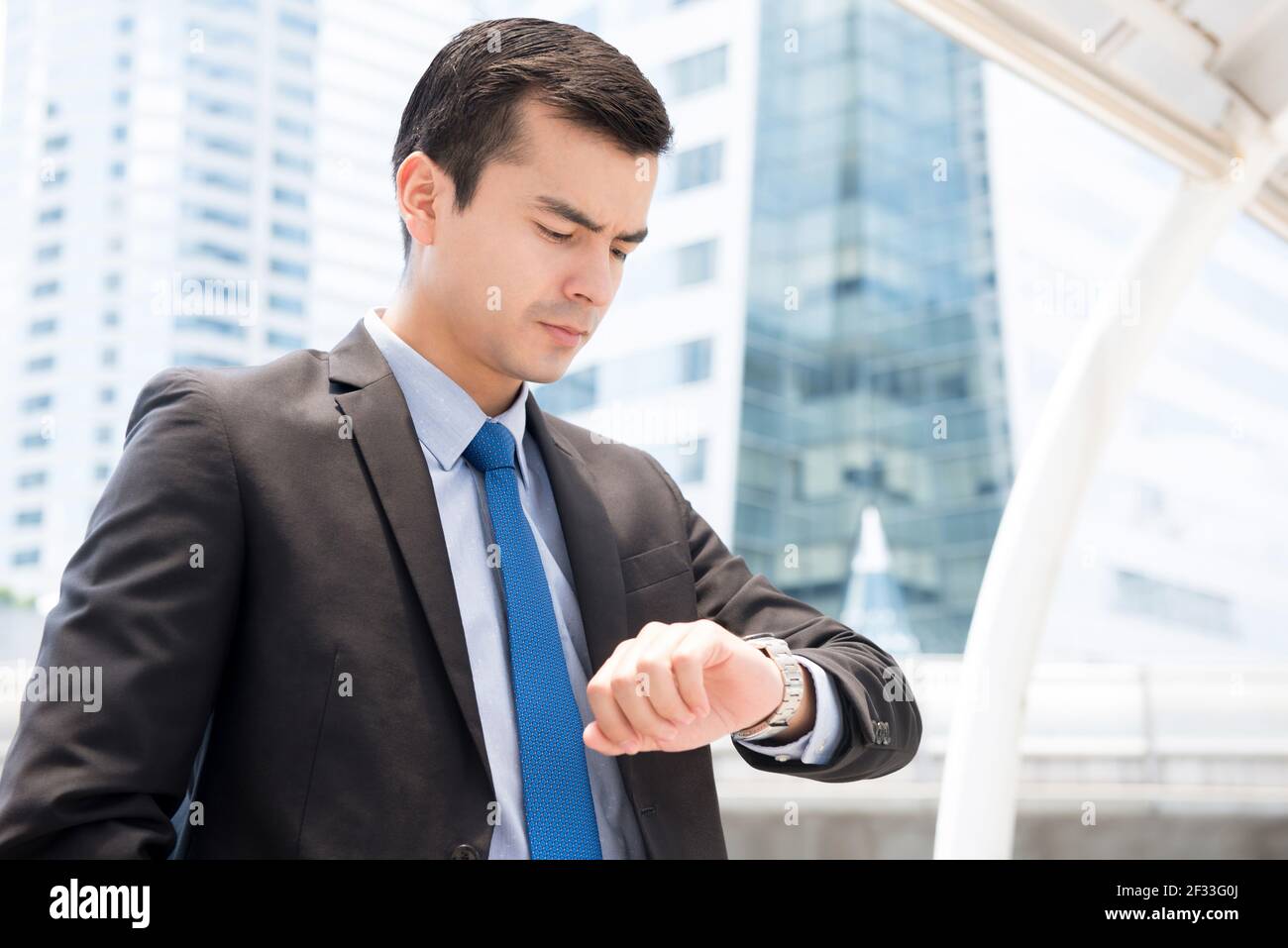 Executive look at watch hi-res stock photography and images - Alamy