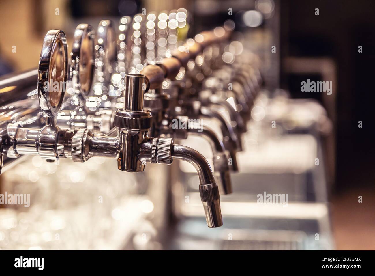 Broad variety of draft beer pipes in a pub ready for serving beer Stock ...