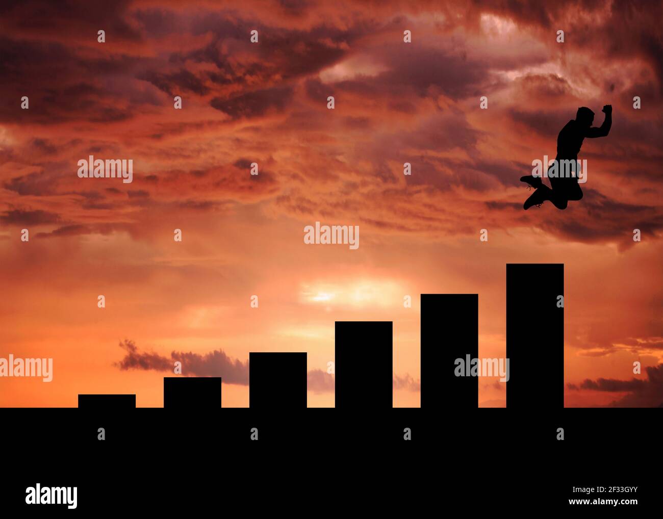 Silhouette of a person jumping on chart in beach. businessman sunset ...