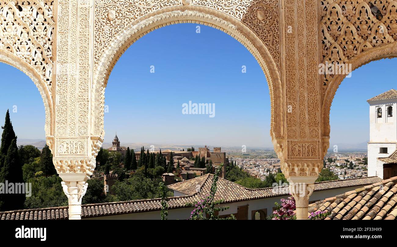 Arches in Islamic (Moorish) style and Alhambra, Granada, Spain Stock ...