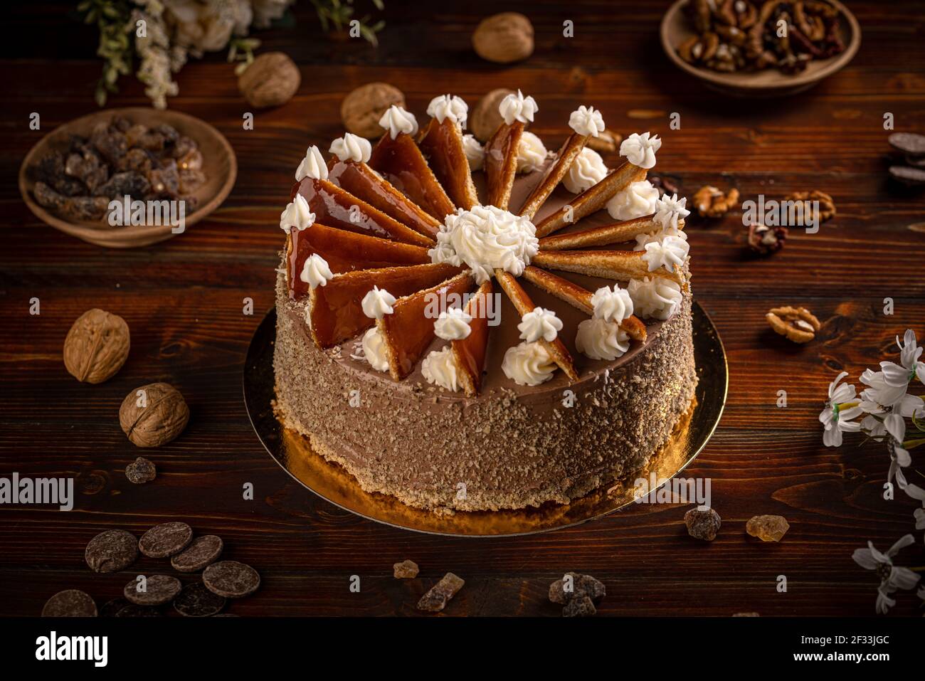 Dobos cake with nuts Stock Photo - Alamy