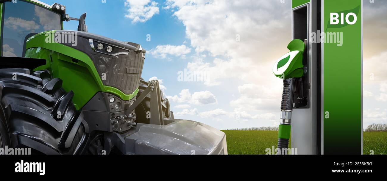 Biofuel filling station and agricultural tractor Stock Photo - Alamy