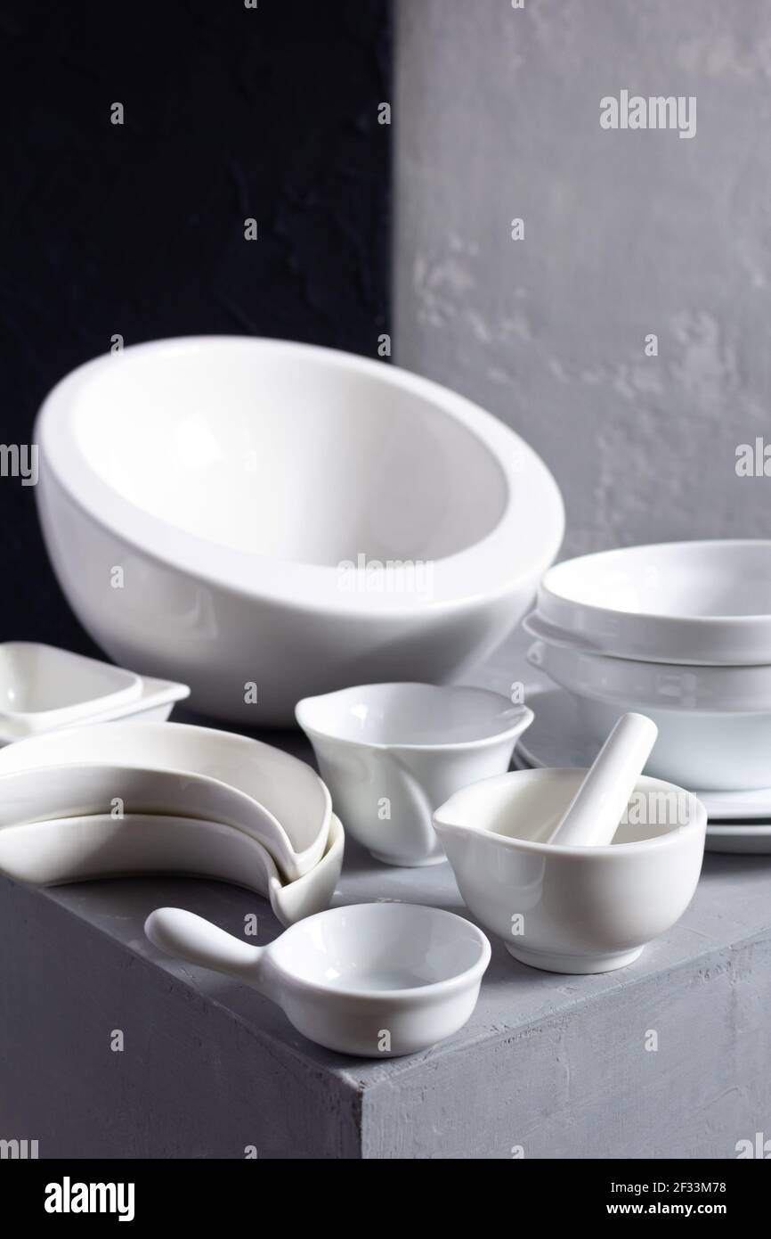 Empty crockery or ceramic dishes set. Kitchen dishware and tableware on ...