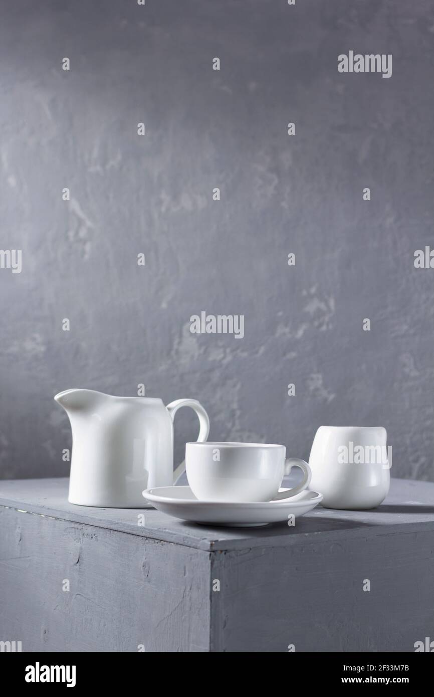 Empty crockery or ceramic dishes set. Kitchen dishware and tableware on ...