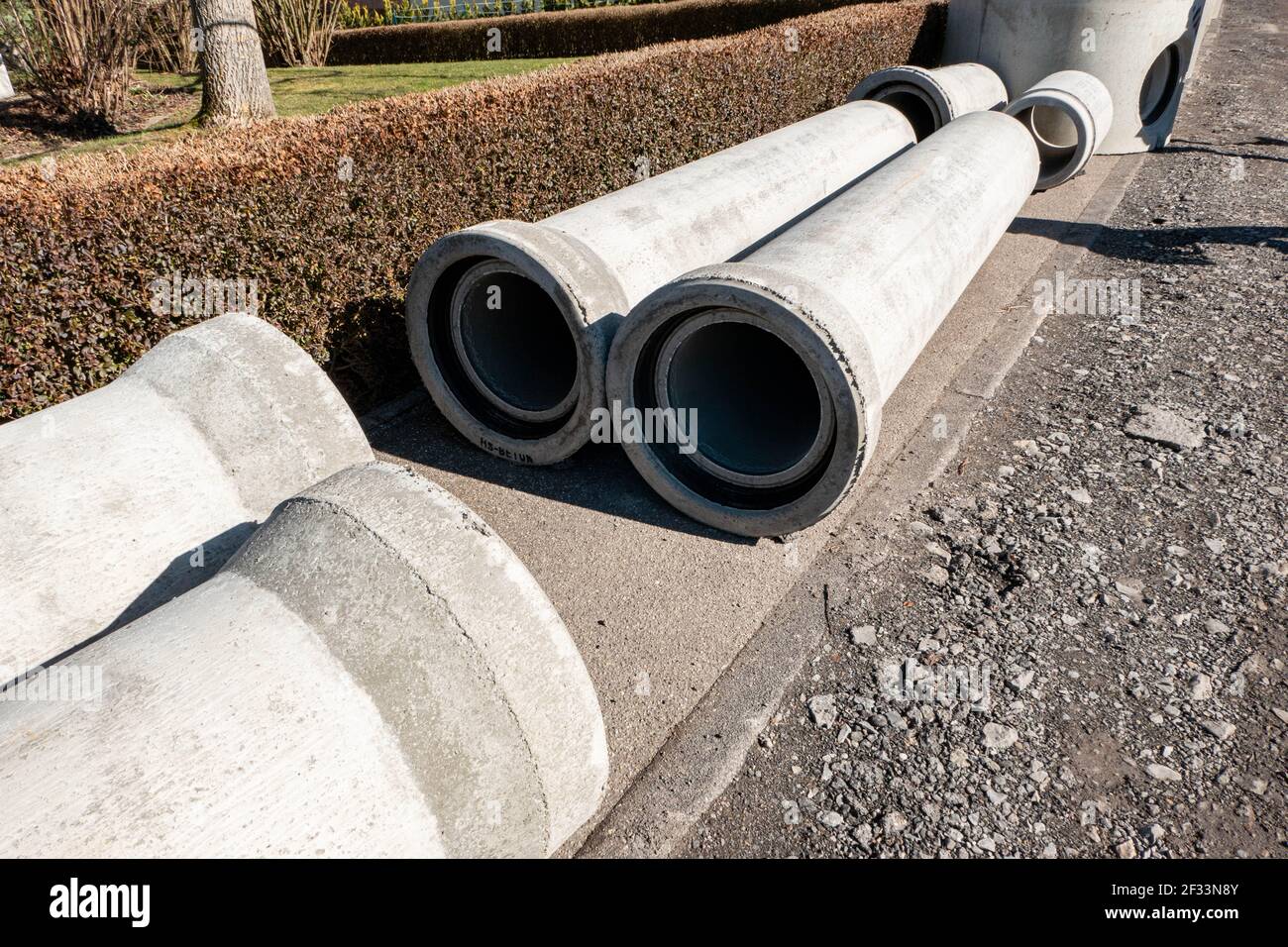 Empty concrete pipes for sewerage on the construction site Stock Photo ...