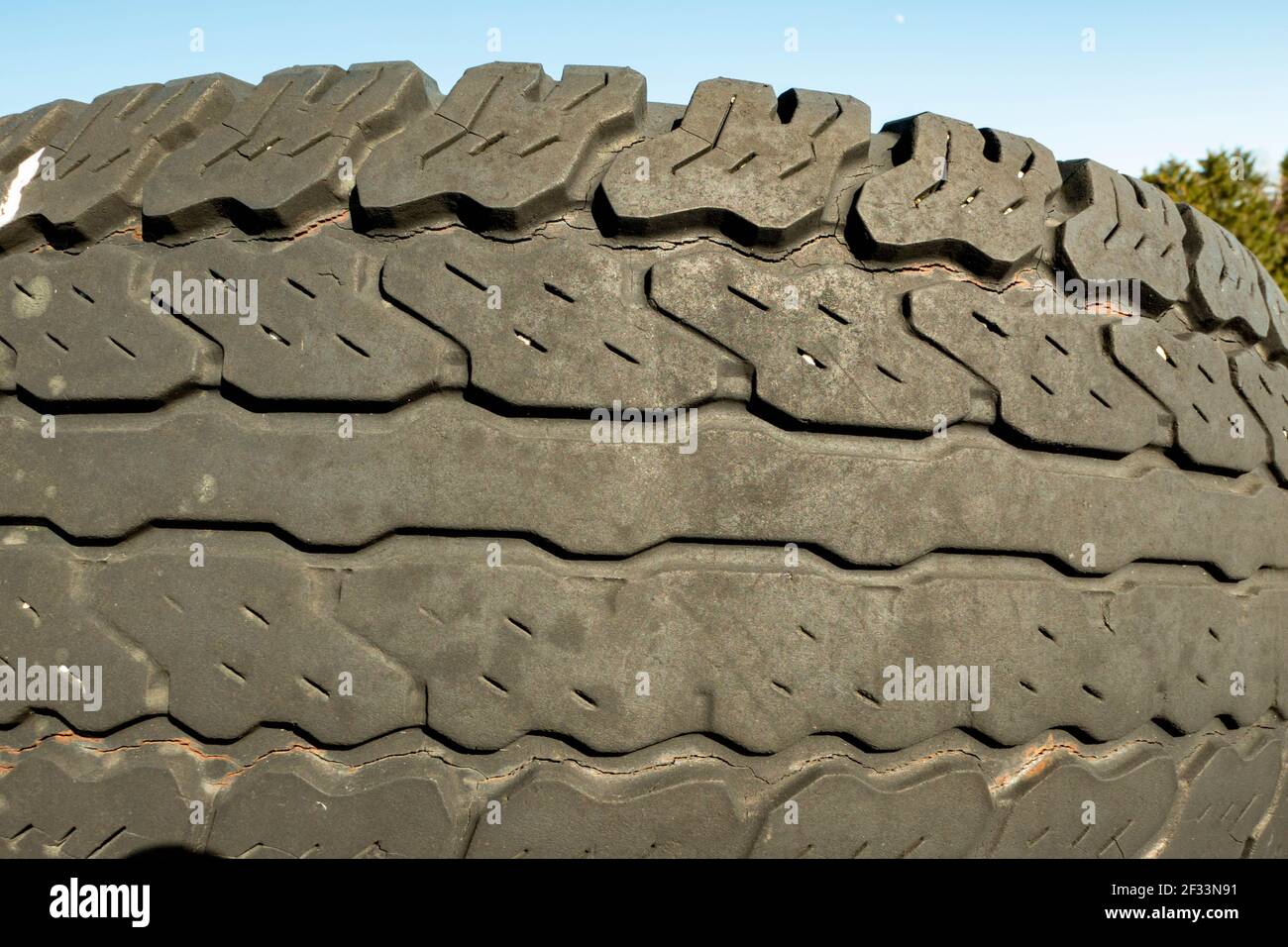 Tire tread worn with stones and old Stock Photo - Alamy