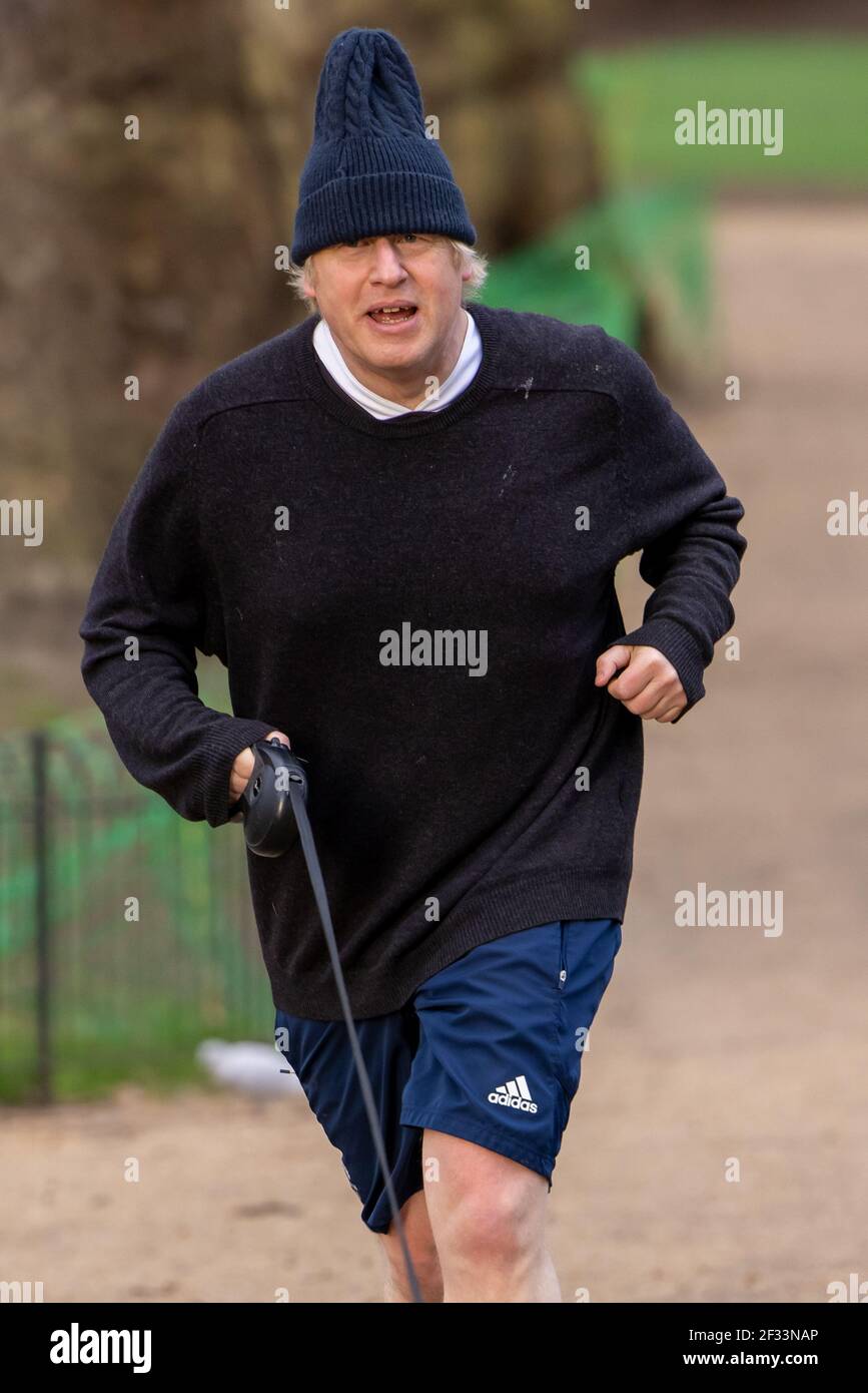 Boris johnson walking the dog hi-res stock photography and images - Alamy