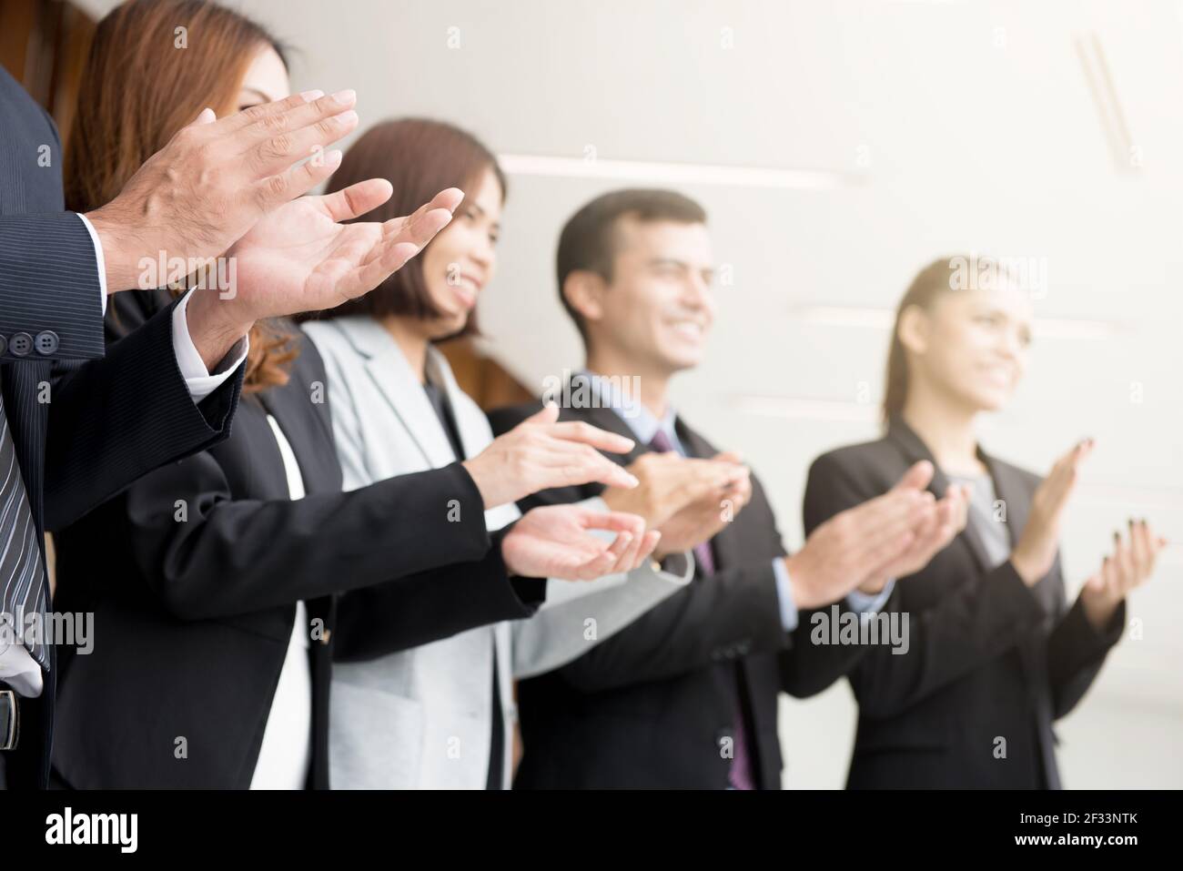 Business people clapping their hands in the meeting, congratulation and ...