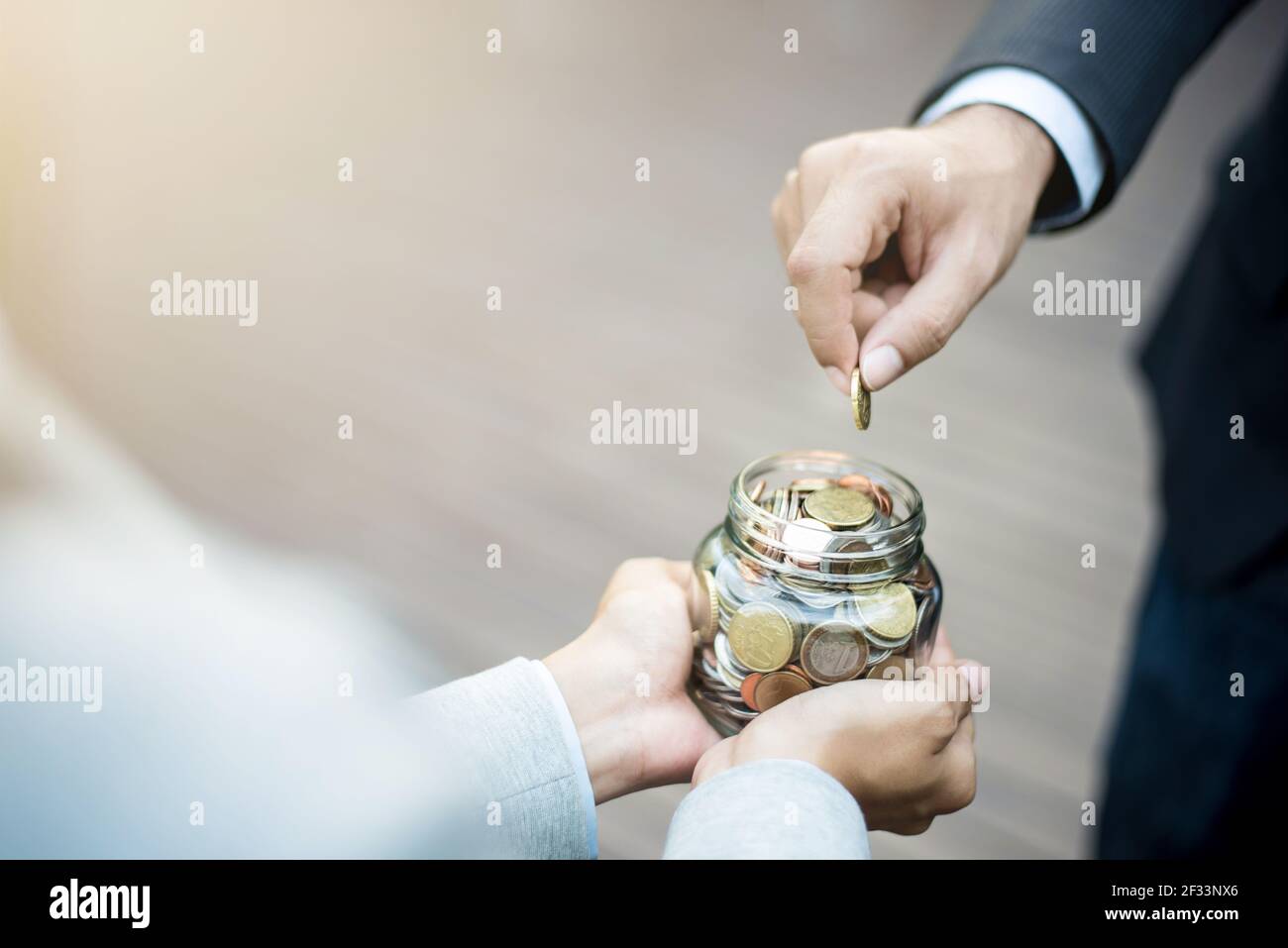 Donation jar hi-res stock photography and images - Alamy