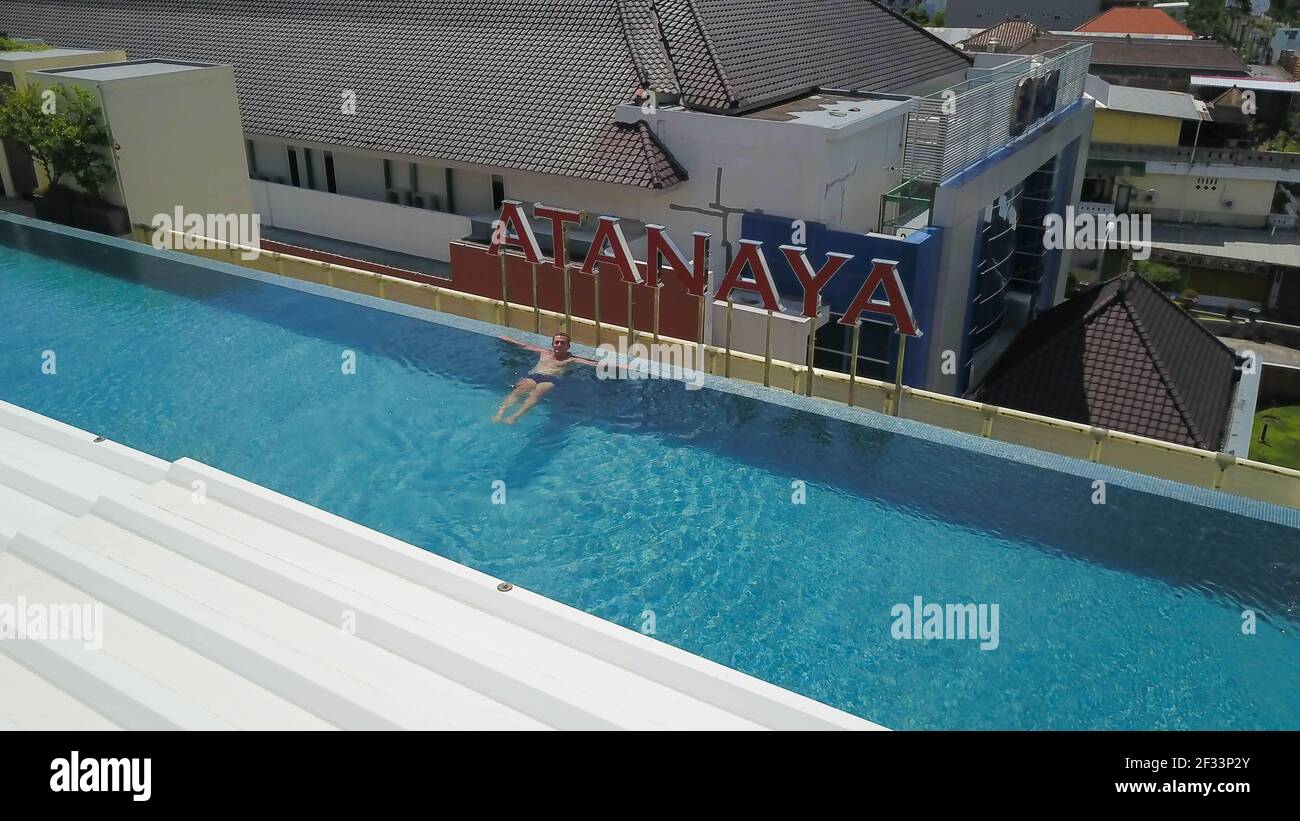 Kuta, Bali, Indonesia, March 13, 2021. Aerial footage of a man in the ...